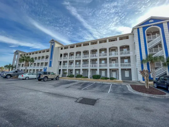 Screened Balcony Overlooking Pond And Elevator Access - Charming Oasis - Sunset Beach, NC